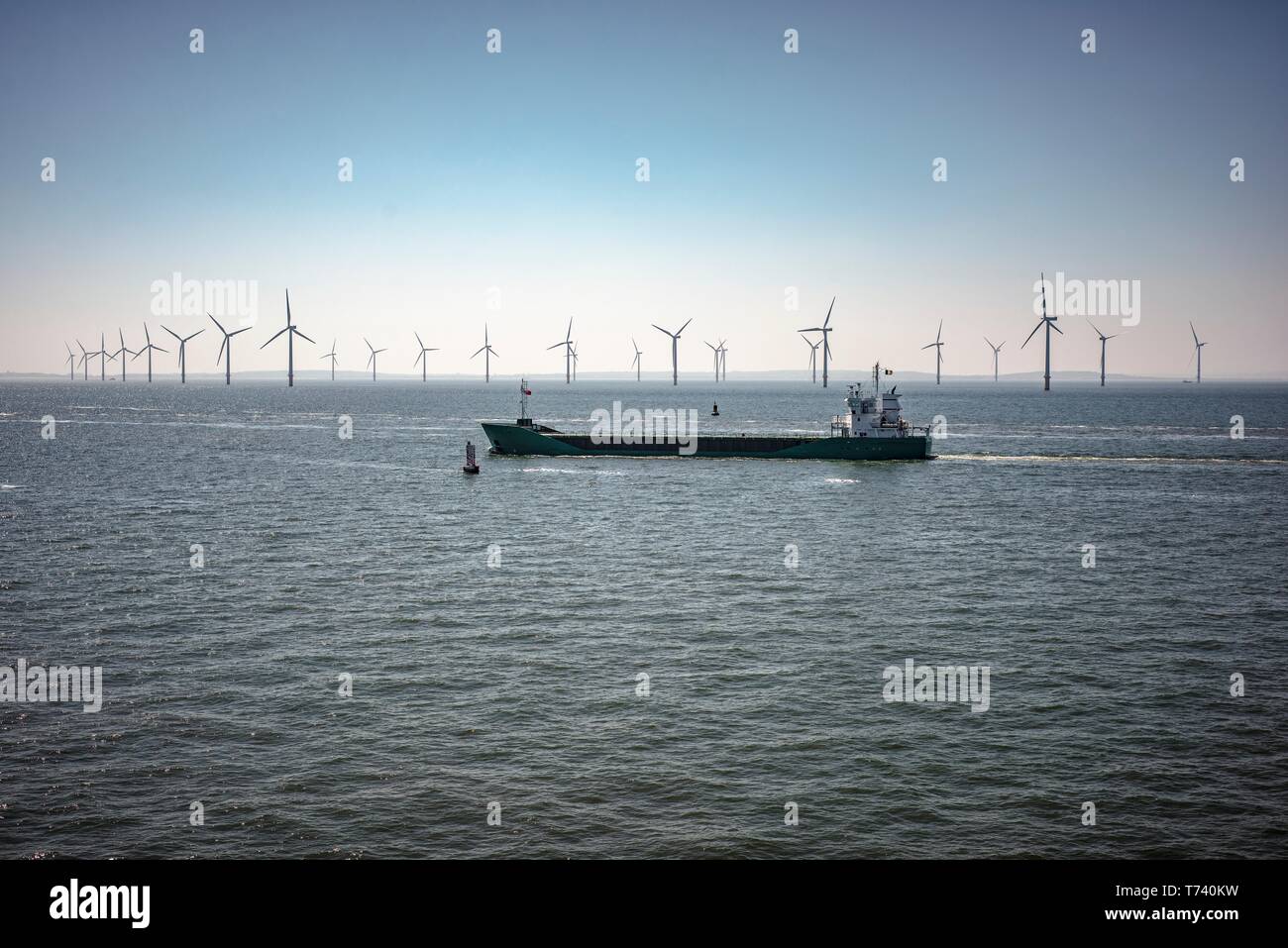 Ship passing wind turbines Stock Photo - Alamy