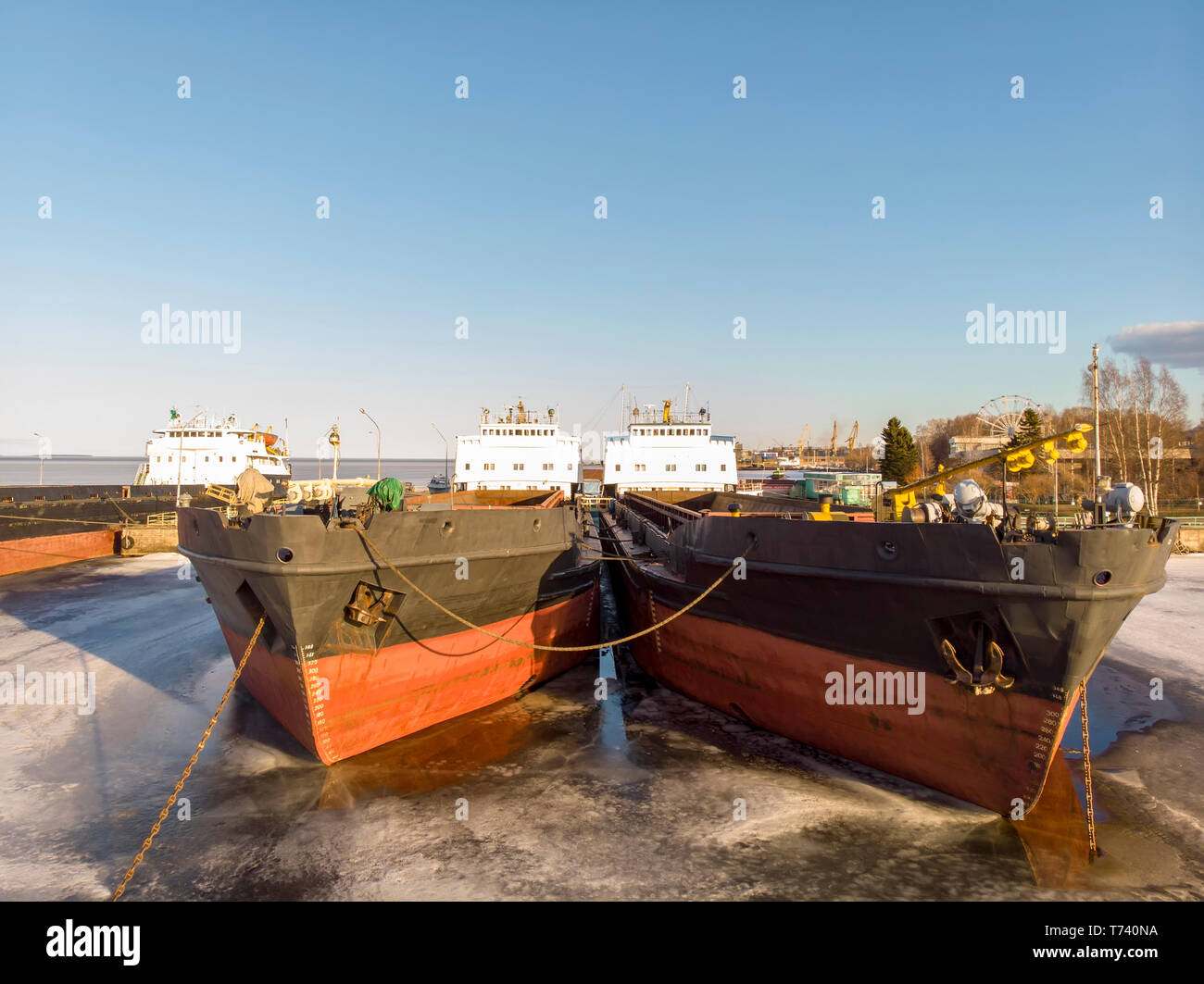 Cargo ship docked in port Stock Photo - Alamy