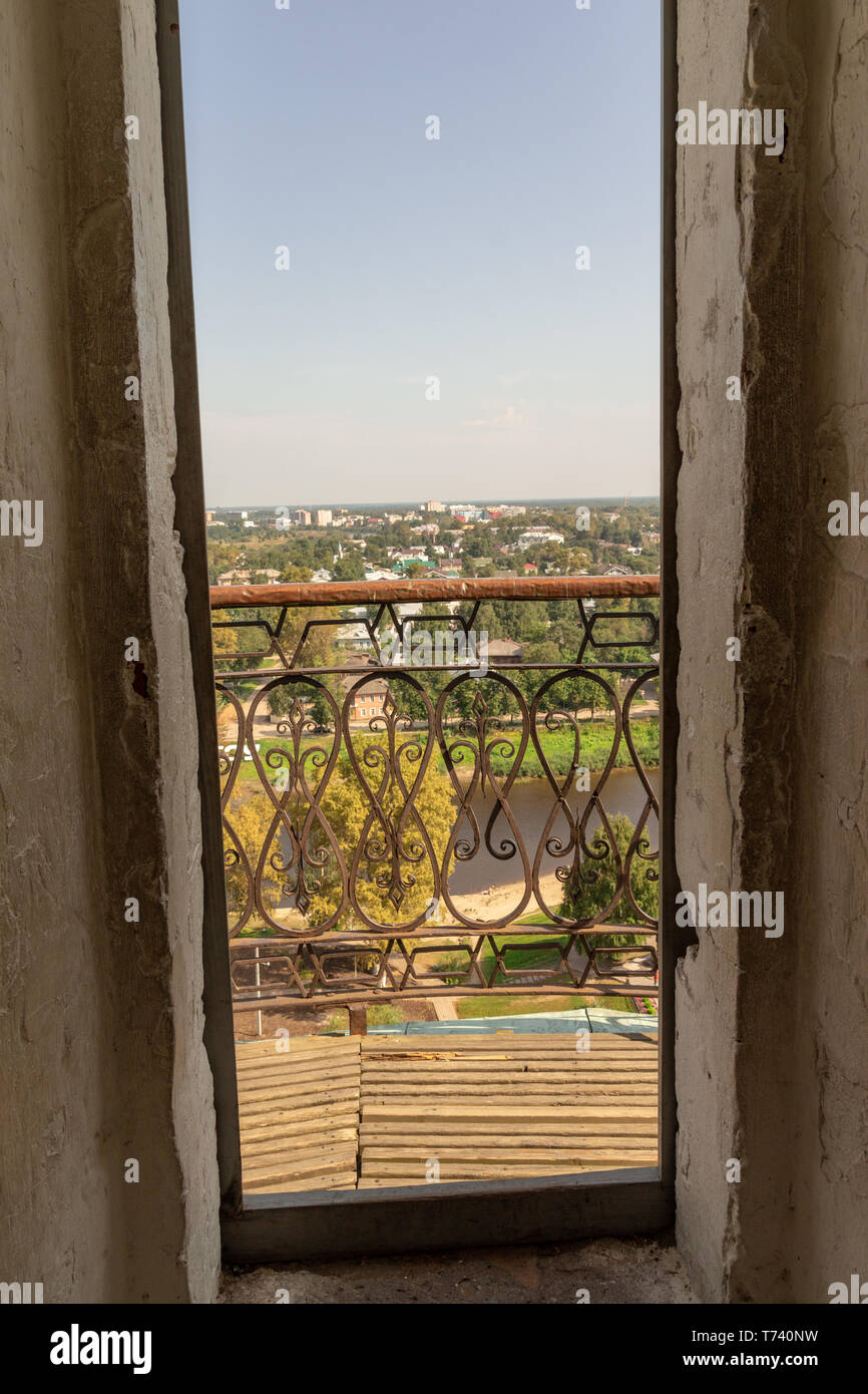 Modern window with skyscraper view in brick wall Stock Photo - Alamy
