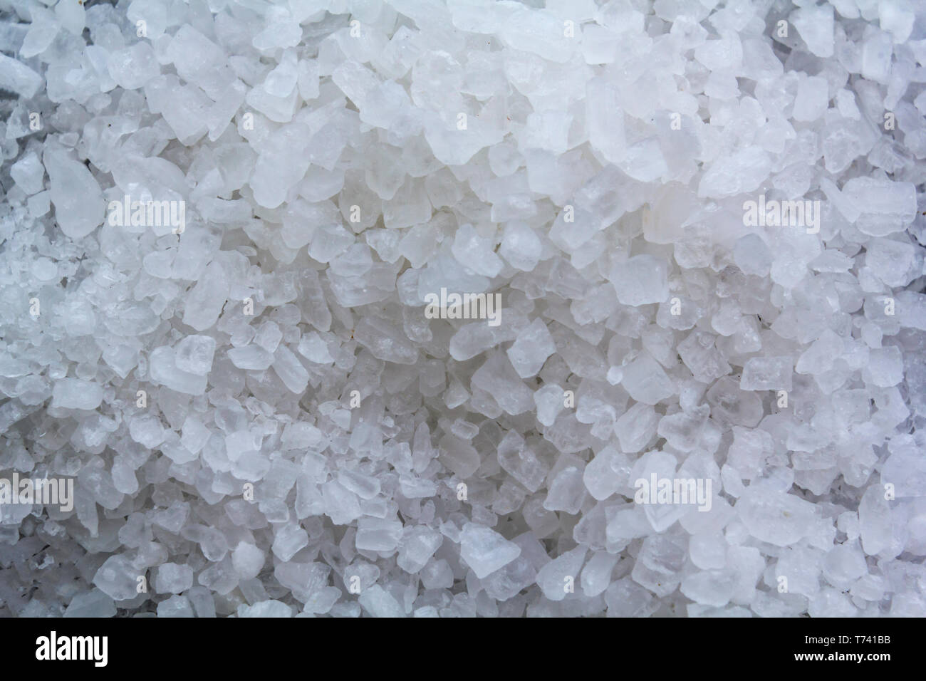 Coarse salt background. Top view Stock Photo - Alamy