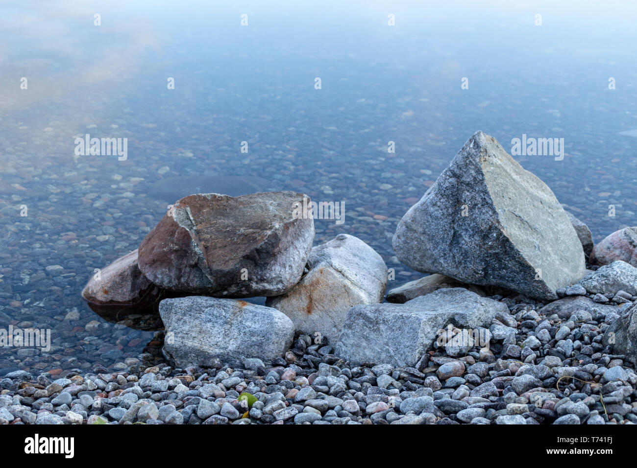 Reflection for natural grey stones for a corner Stock Photo - Alamy
