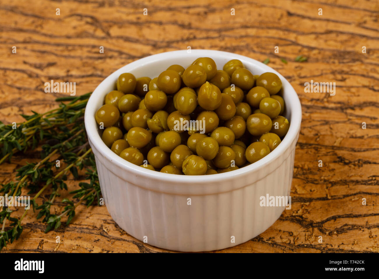 Marinated Pickled green peas in the bowl Stock Photo - Alamy
