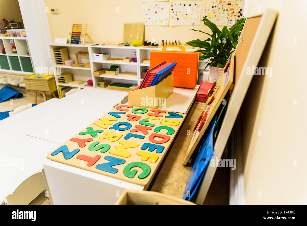 Alphabet with wooden letters in a children's classroom Stock Photo - Alamy