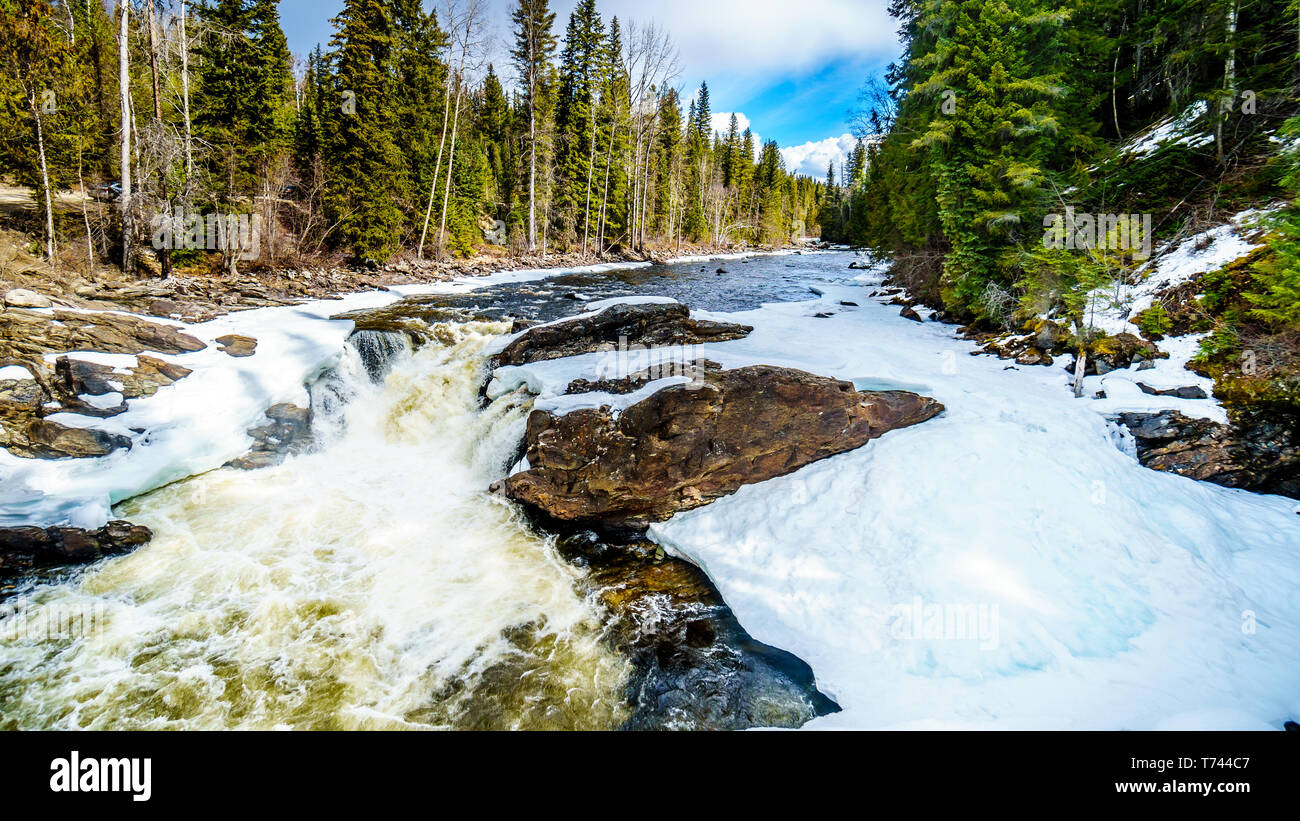The partly frozen Murtle River after Mushbowl Falls in the Cariboo ...