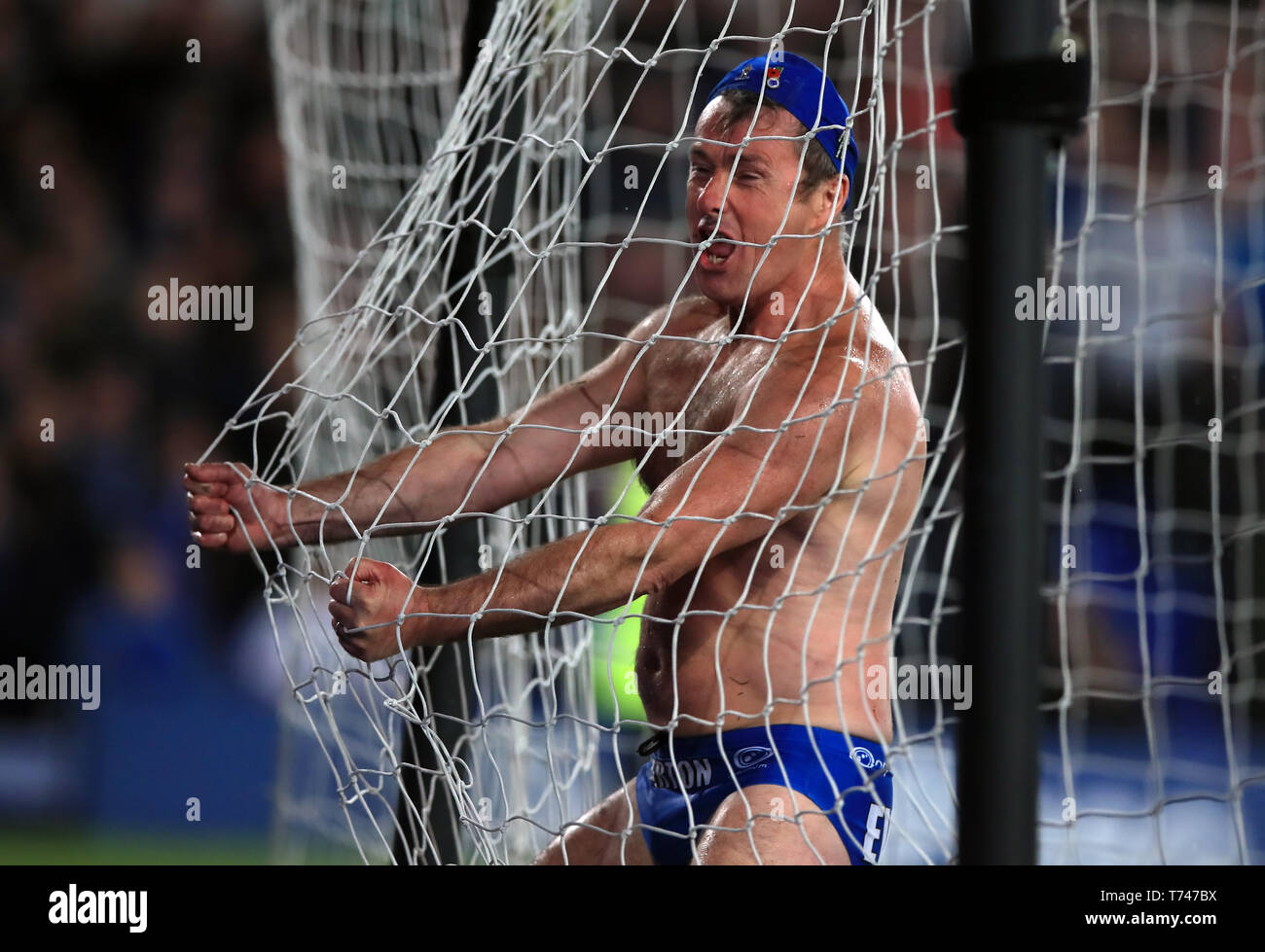 Speedo Mick on the pitch at half time of the Premier League match at ...
