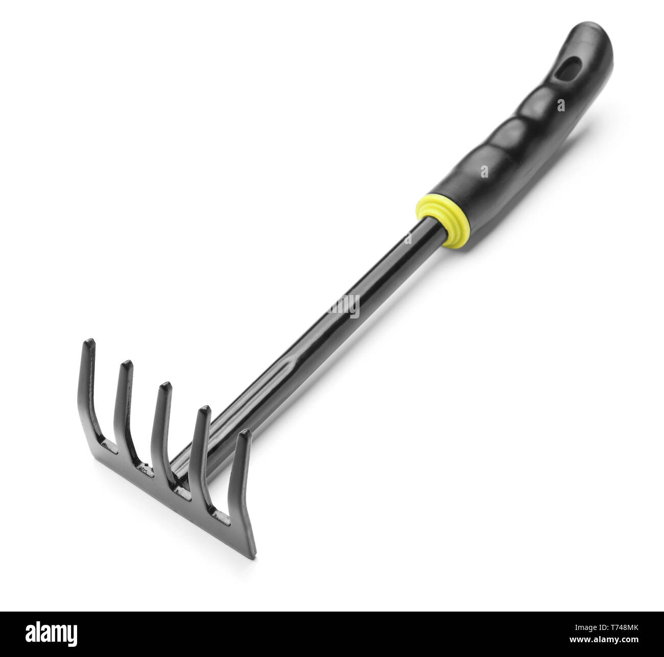 Metal rake for gardening on white background Stock Photo - Alamy