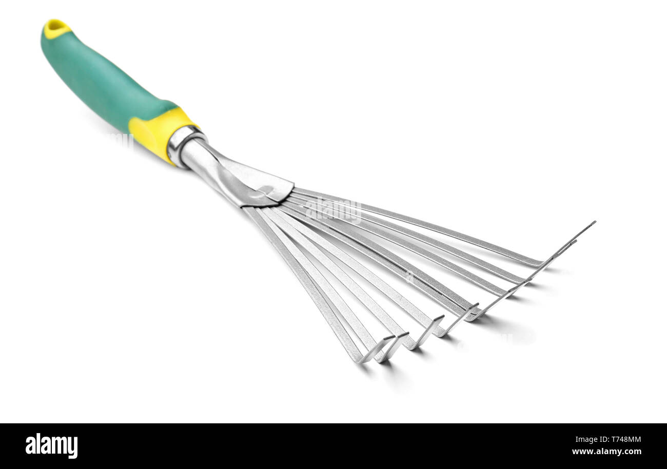 Metal rake for gardening on white background Stock Photo - Alamy