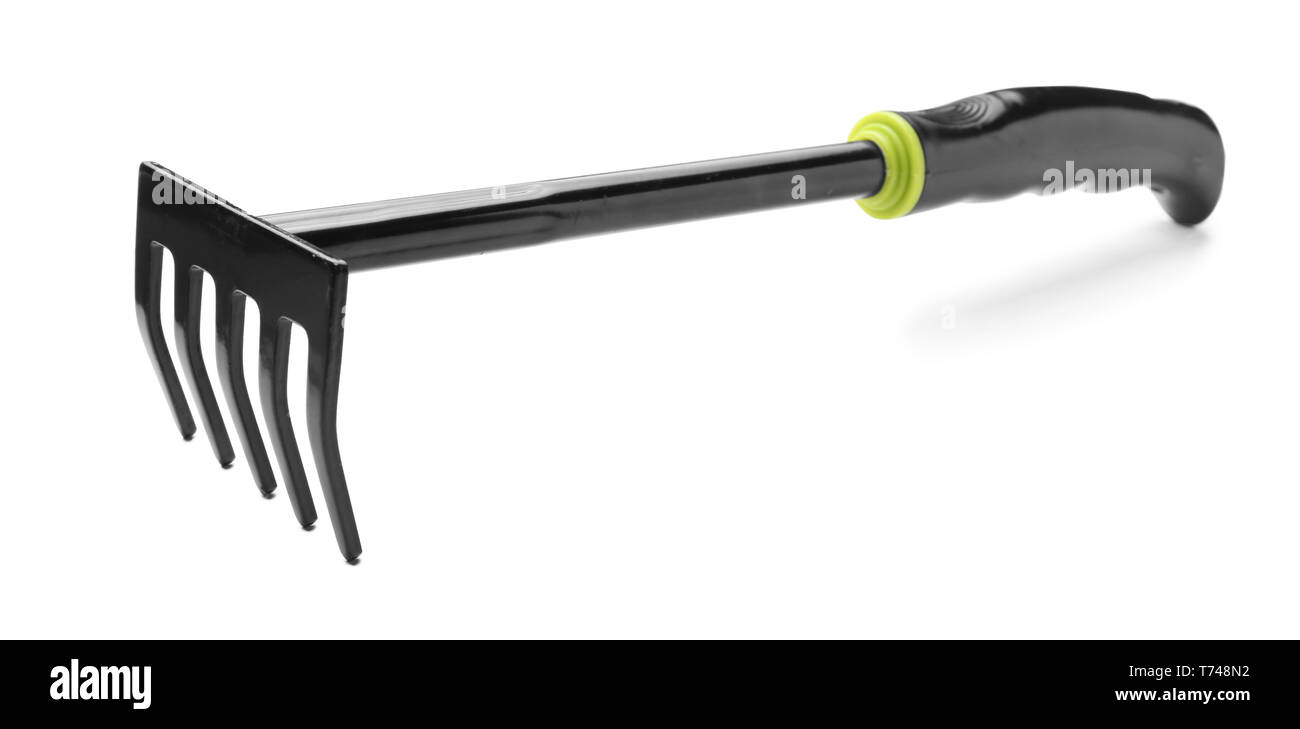 Metal rake for gardening on white background Stock Photo - Alamy