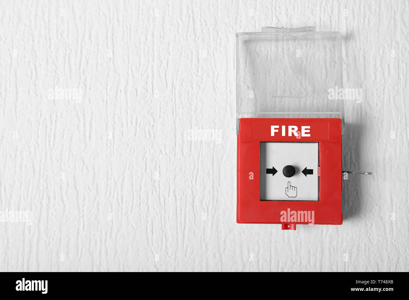 Modern fire call point on wall indoors Stock Photo - Alamy