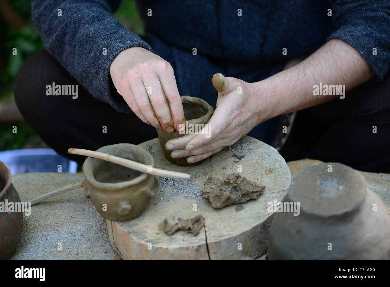 Ancient Dacian potter man making a clay bowl Stock Photo - Alamy