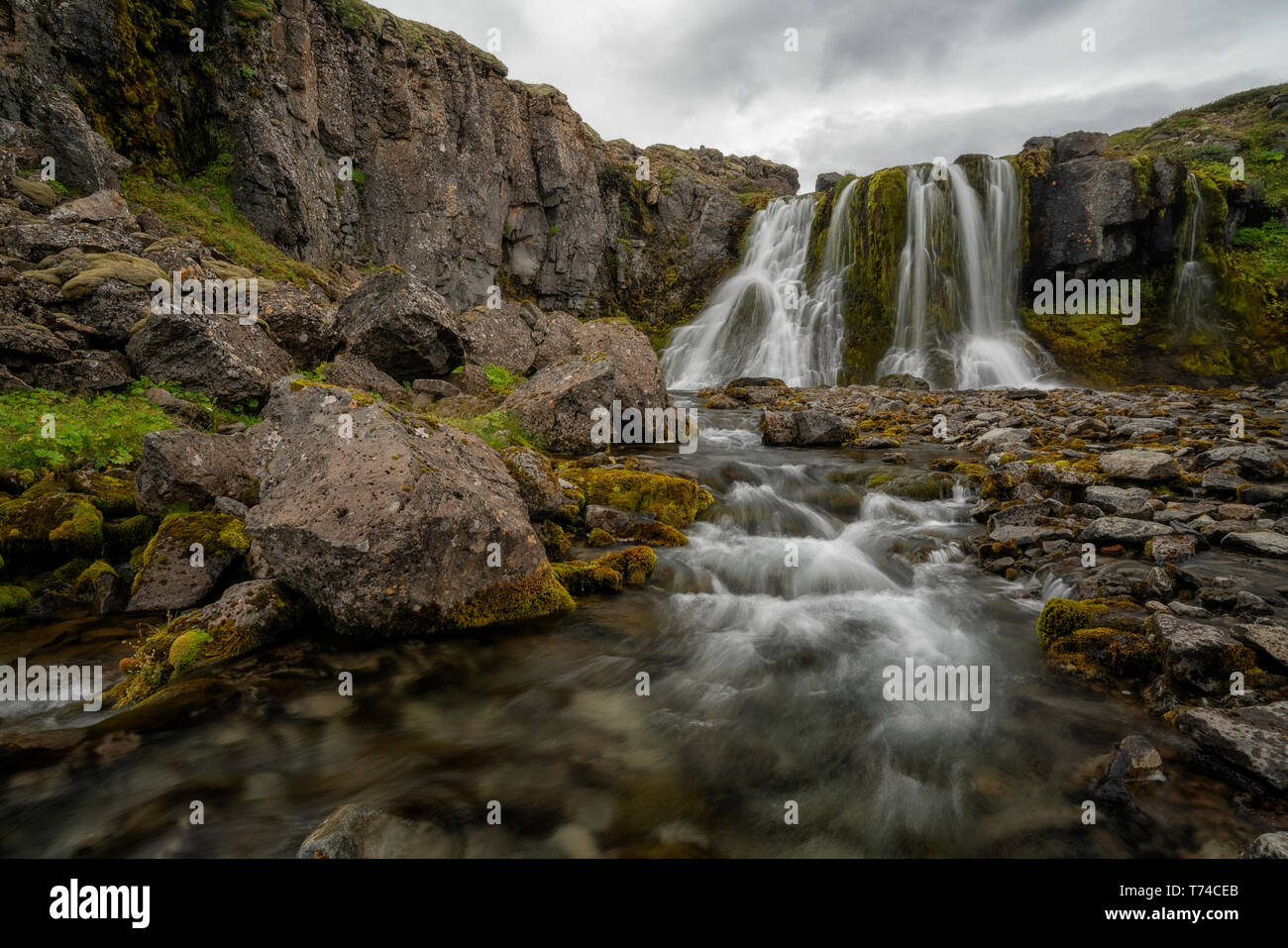 Waterfall along the road on the West Fjords; West Fjords, Iceland Stock ...