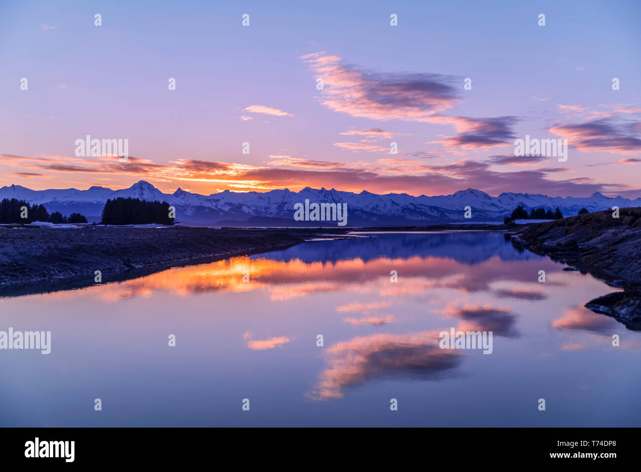 Eagle River and Chilkat Mountains at sunset; Alaska, United States of ...