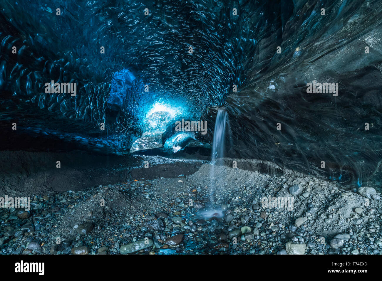 Glacial ice cave with waterfall hi-res stock photography and images - Alamy