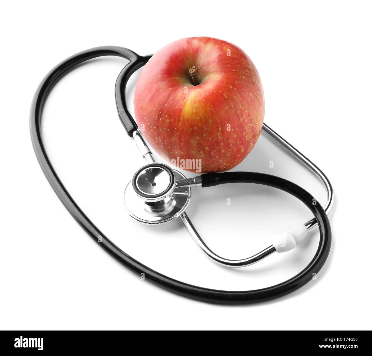 Stethoscope with apple on white background. Health care concept Stock ...