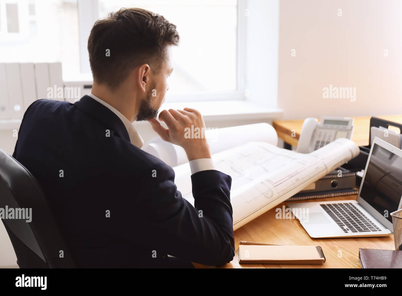 Architect working in office Stock Photo - Alamy