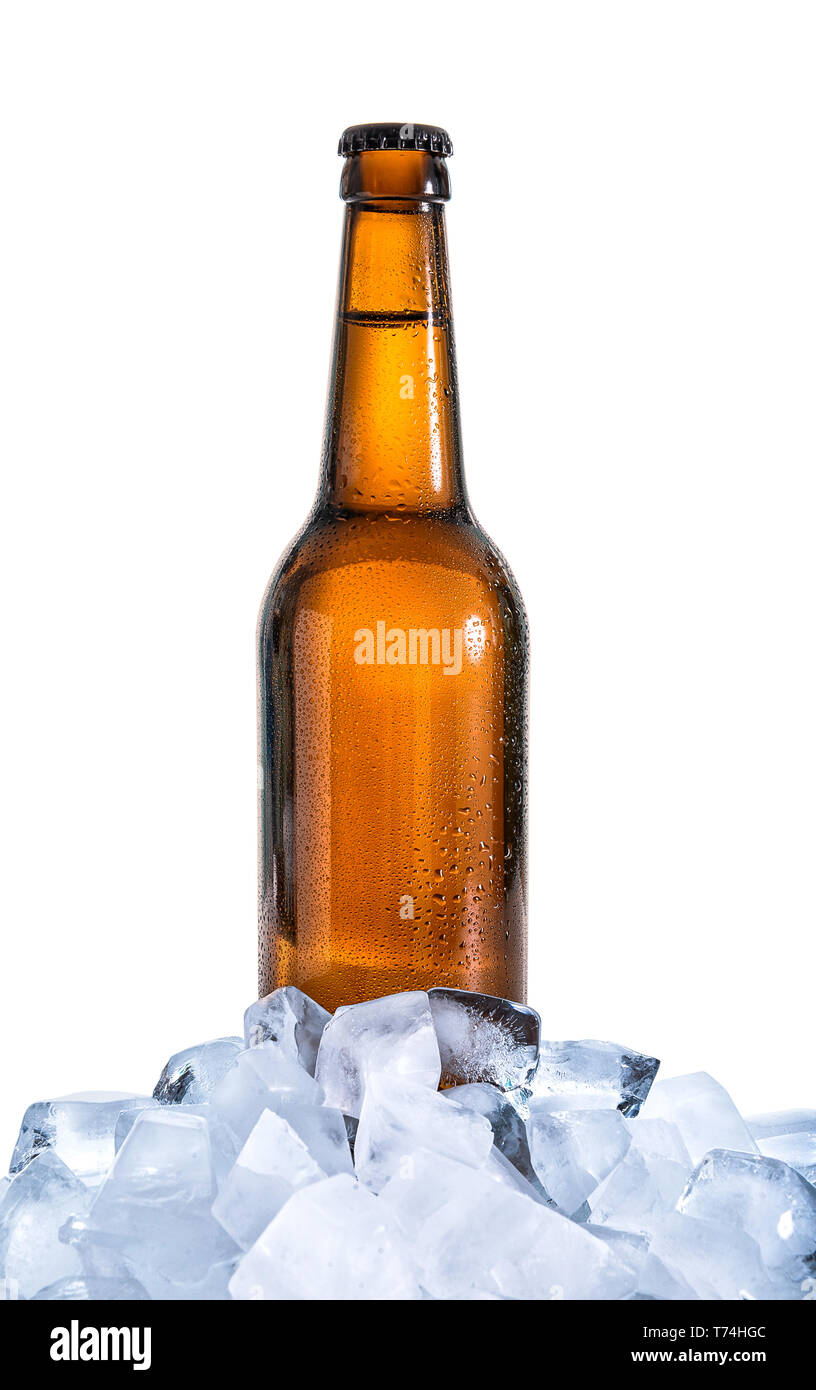 Glass bottle of cold beer in ice on white background Stock Photo - Alamy