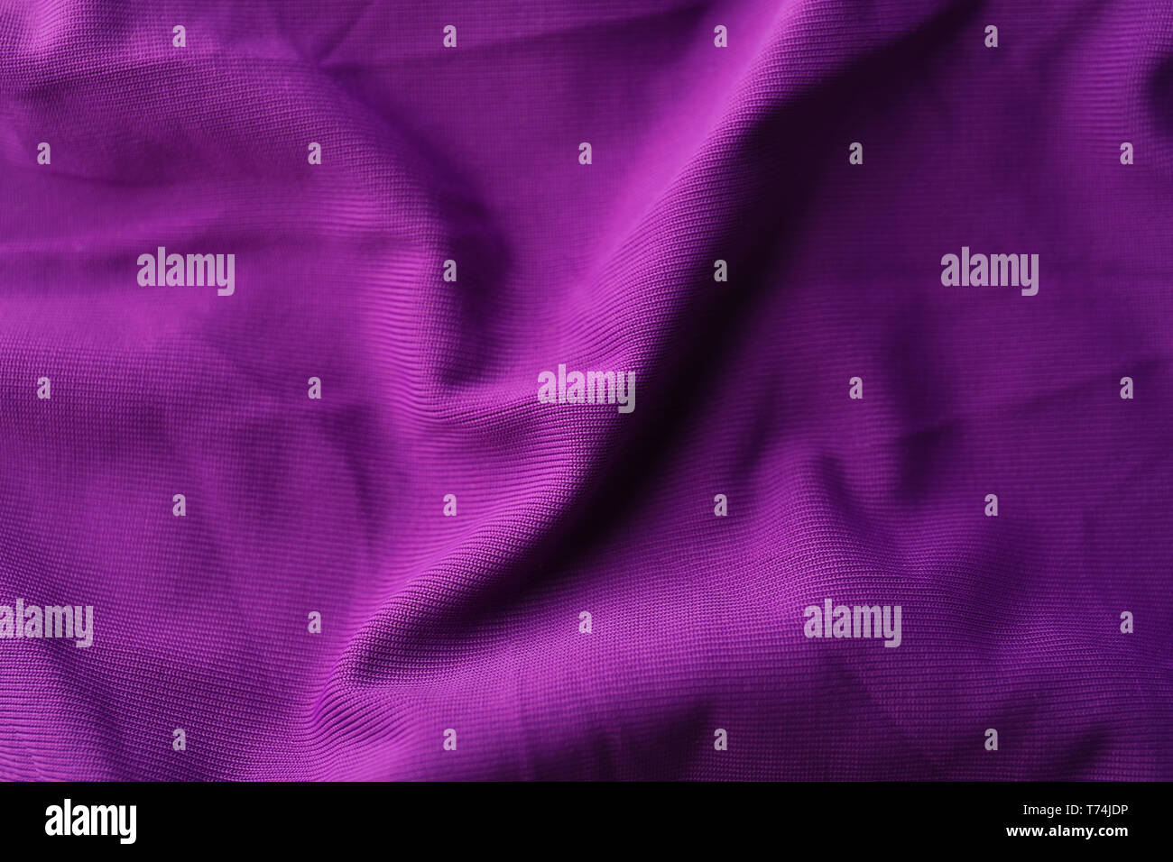 Fabric texture with folds, closeup Stock Photo - Alamy