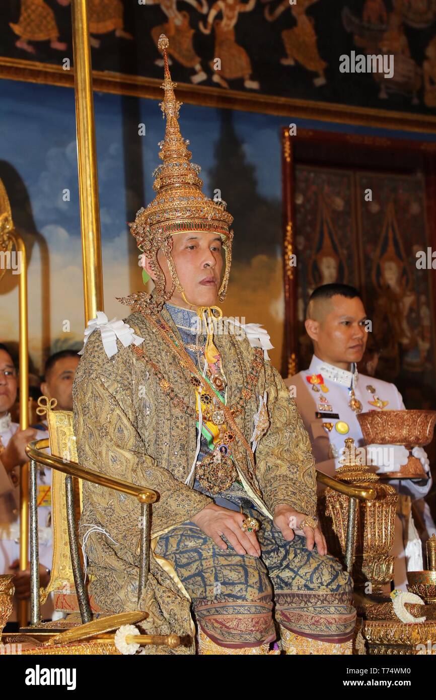 Bangkok, Thailand. 4th May, 2019. Thai King Maha Vajiralongkorn sits on ...