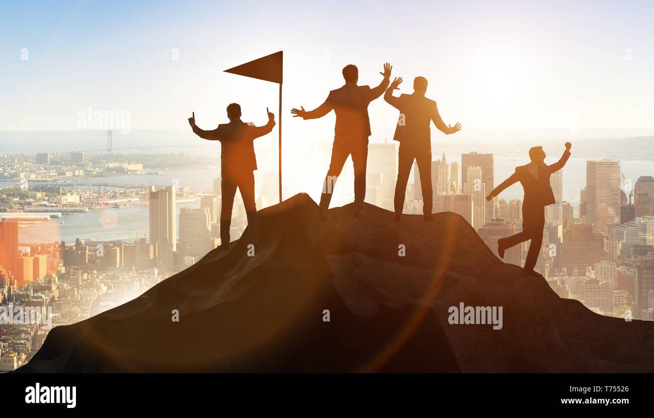Businessmen in achievement and teamwork concept Stock Photo - Alamy