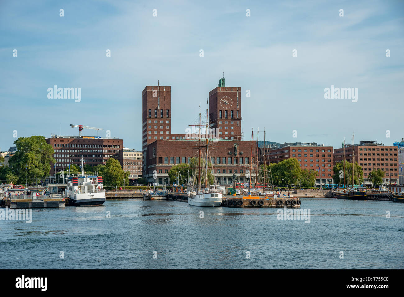 Aker brygge [båt], Ferry Terminal, Oslo, Norway. Oslo City Hall is ...