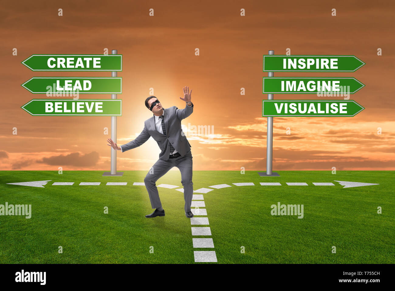 Businessman having hard choice standing at crossroads Stock Photo - Alamy
