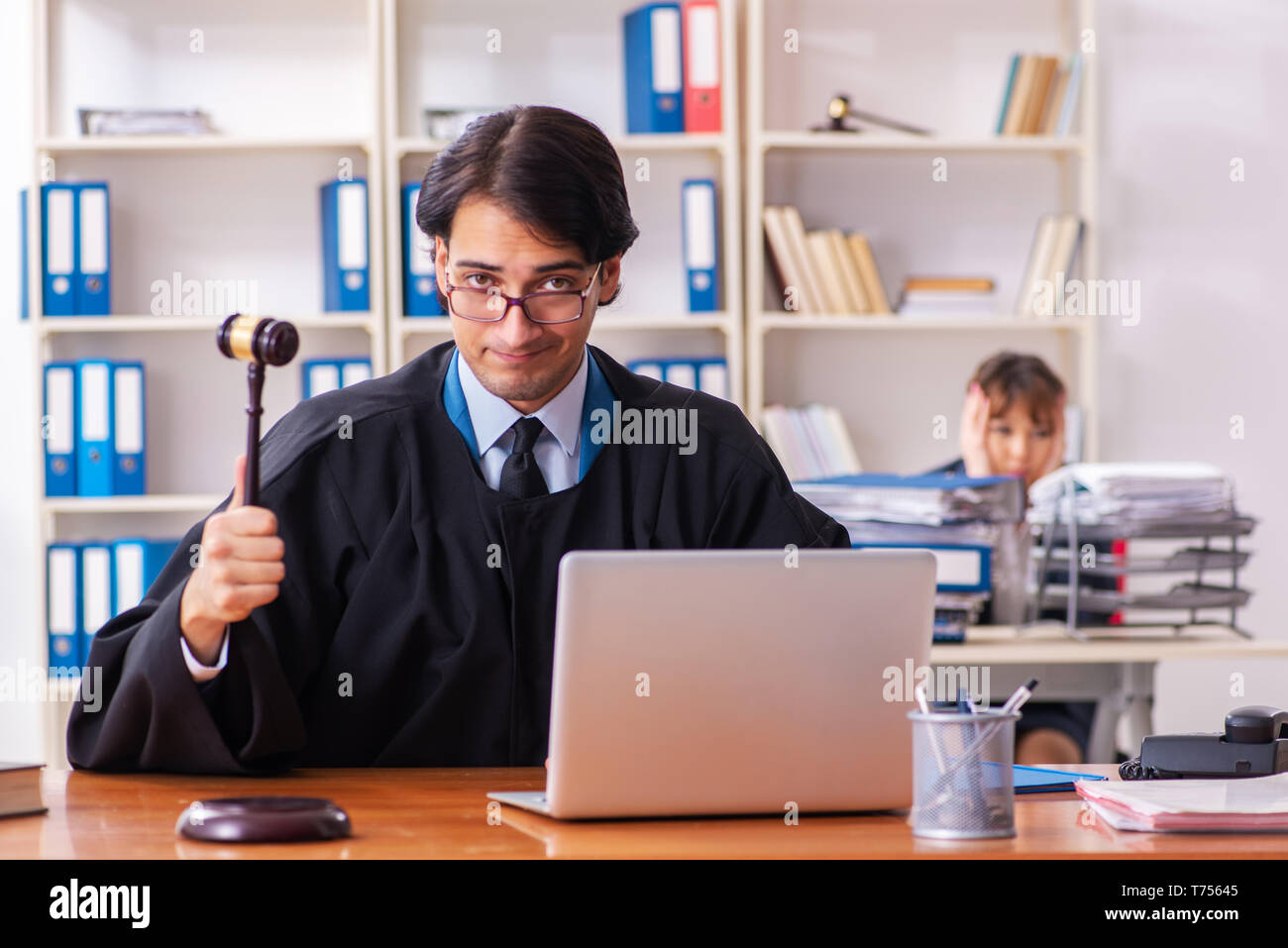 Two lawyers working in the office Stock Photo - Alamy