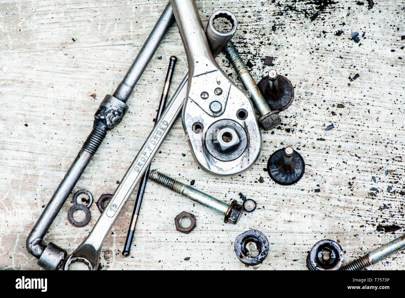 Black Hands working on different machine parts Stock Photo - Alamy