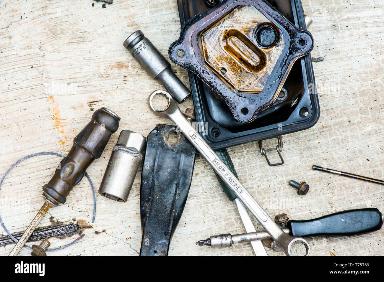 Black Hands working on different machine parts Stock Photo - Alamy