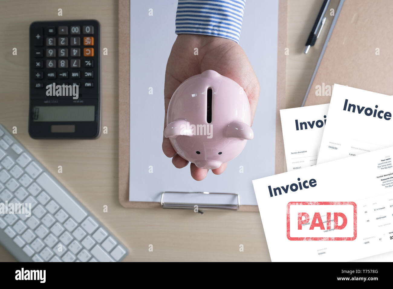 Close-up man work Invoice Bill Paid Payment At Office Invoice savings ...