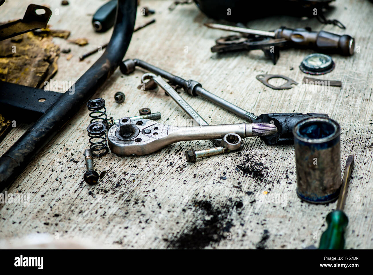 Black Hands working on different machine parts Stock Photo - Alamy
