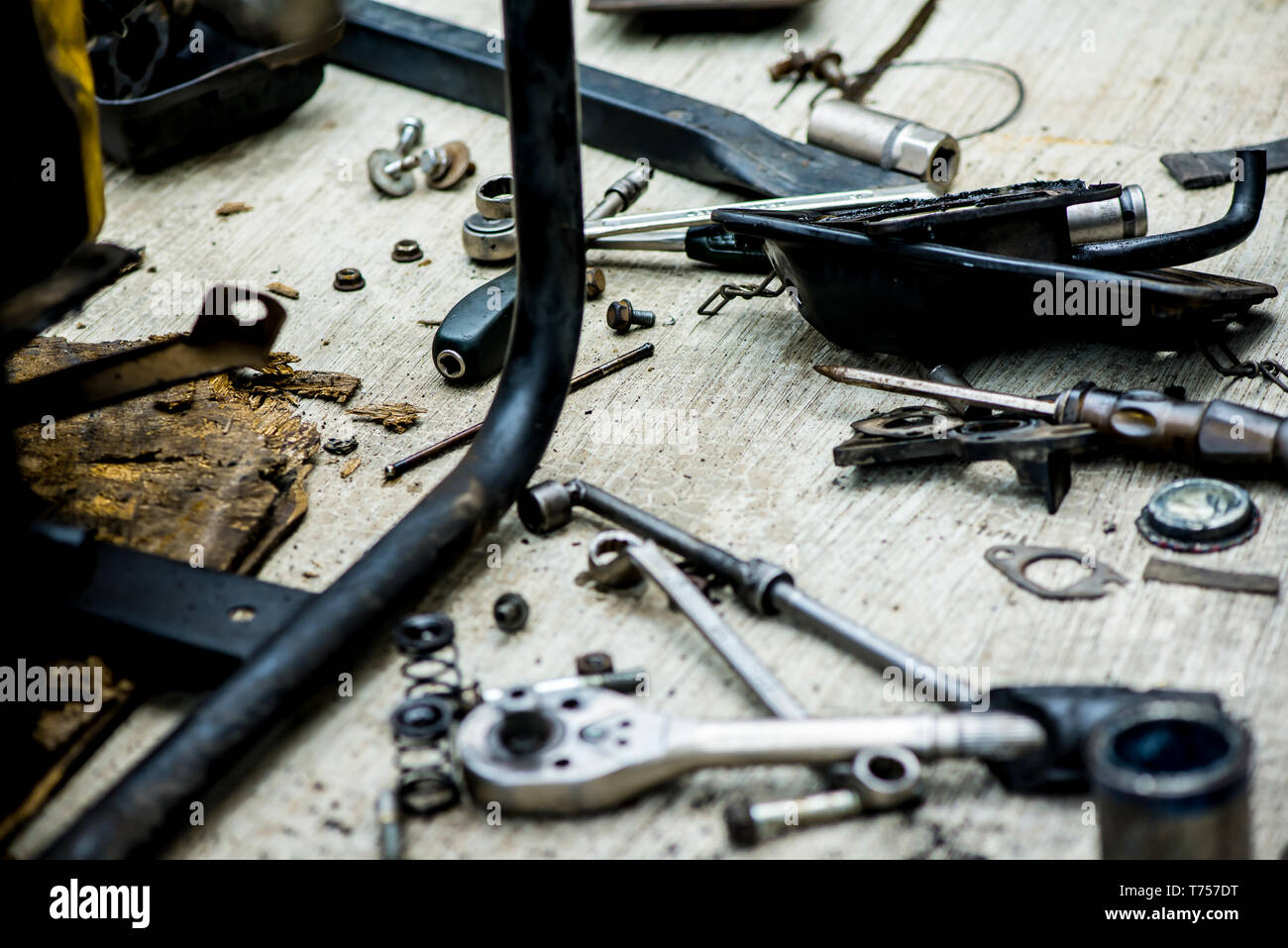 Black Hands working on different machine parts Stock Photo - Alamy