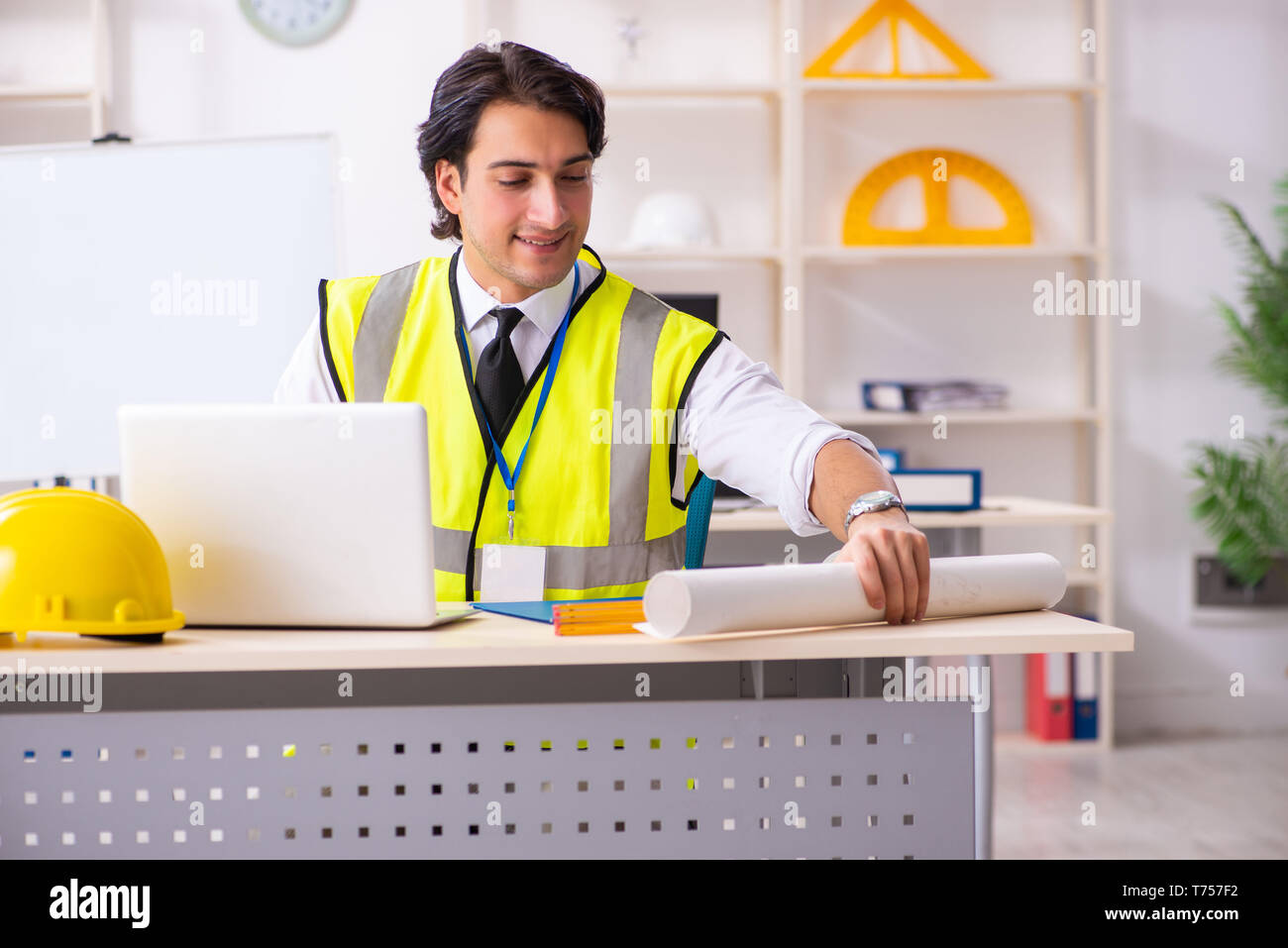 Male construction engineer working in the office Stock Photo - Alamy