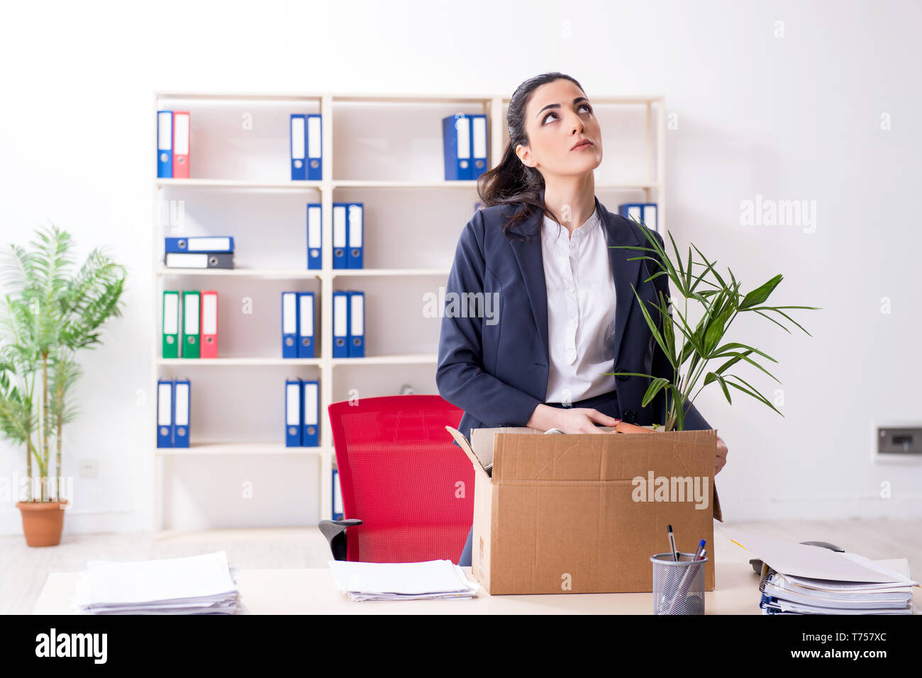 Young female employee being fired from her work Stock Photo - Alamy