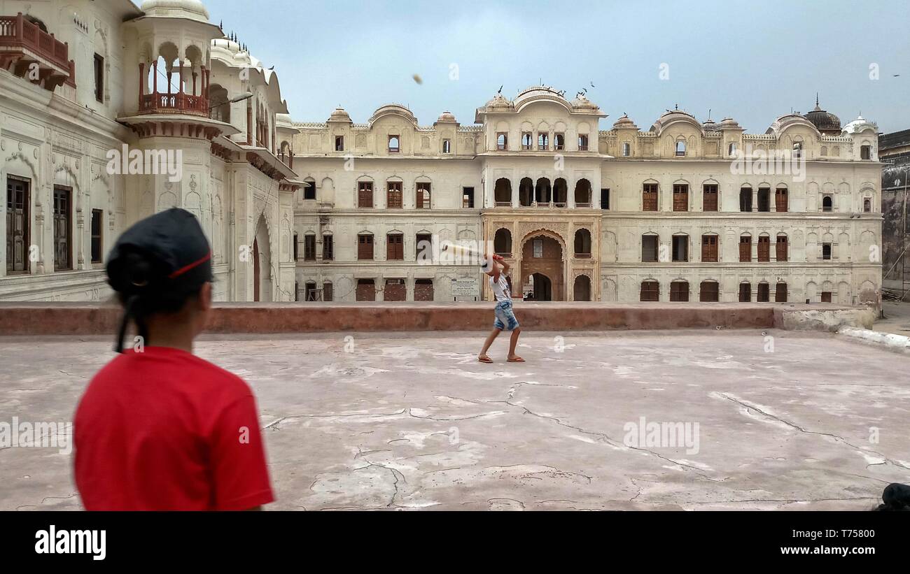 Children are seen playing inside the Qila Mubarak Fort in Patiala ...