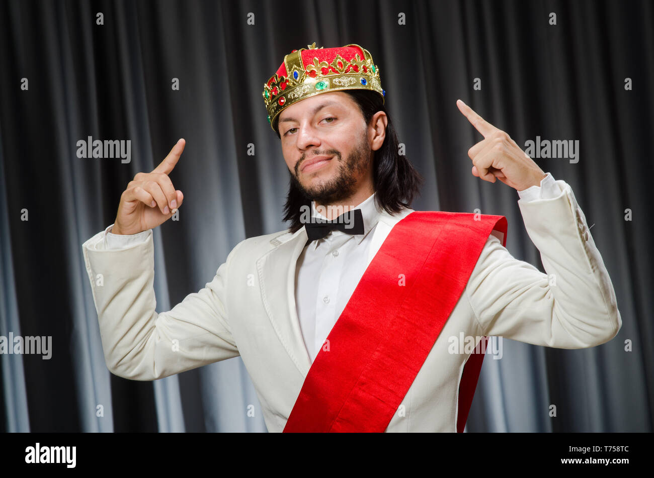 Funny king wearing crown in coronation concept Stock Photo - Alamy