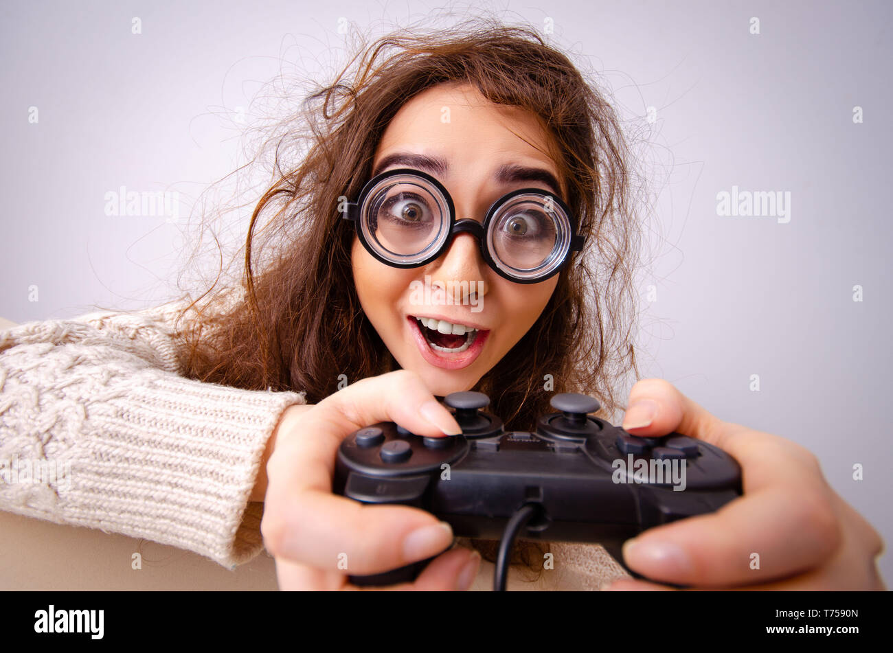 Funny nerd girl working on computer Stock Photo - Alamy