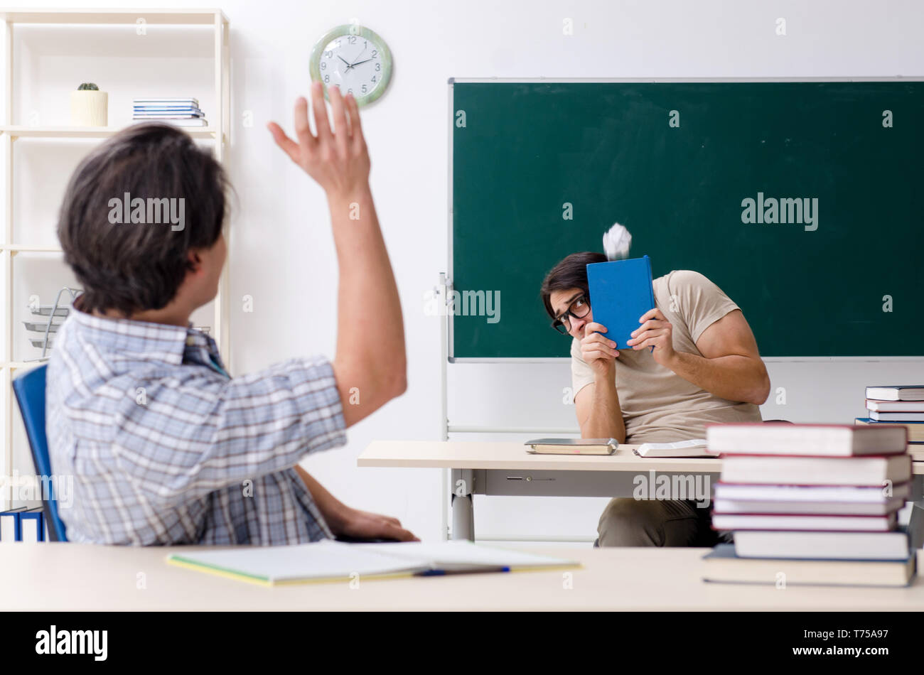 Two male students in the classroom Stock Photo - Alamy