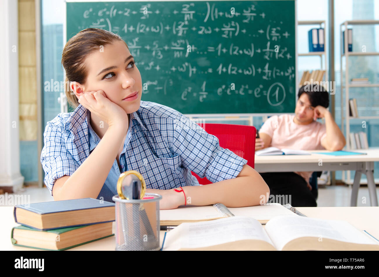 Young students taking the math exam in classroom Stock Photo - Alamy