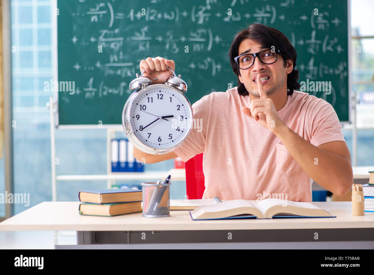 Student missing in classroom hi-res stock photography and images - Alamy