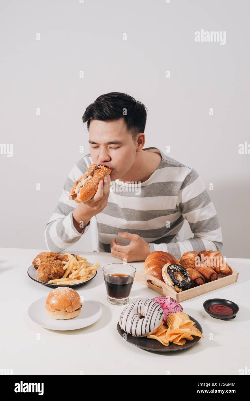 Fat man eating restaurant hi-res stock photography and images - Alamy