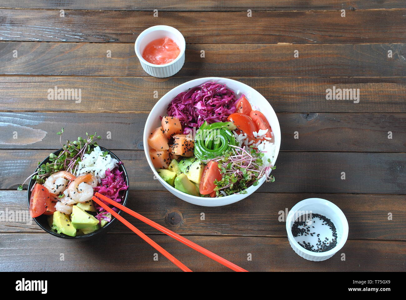 Organic food. Fresh seafood recipe. Two fresh poke bowls with salmon ...