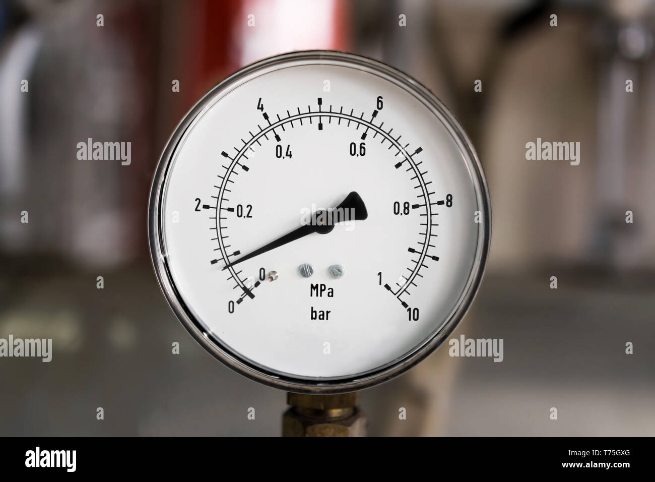Metal industrial pressure gauge Stock Photo - Alamy