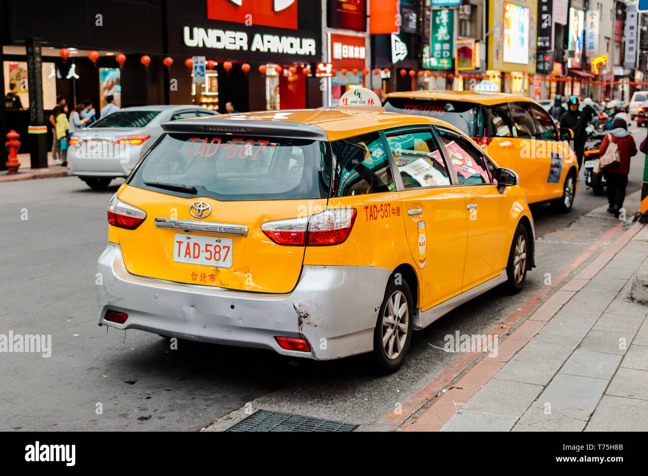 Taipei, Taiwan: Yellow Van Taxi park and wait for the passenger in ...