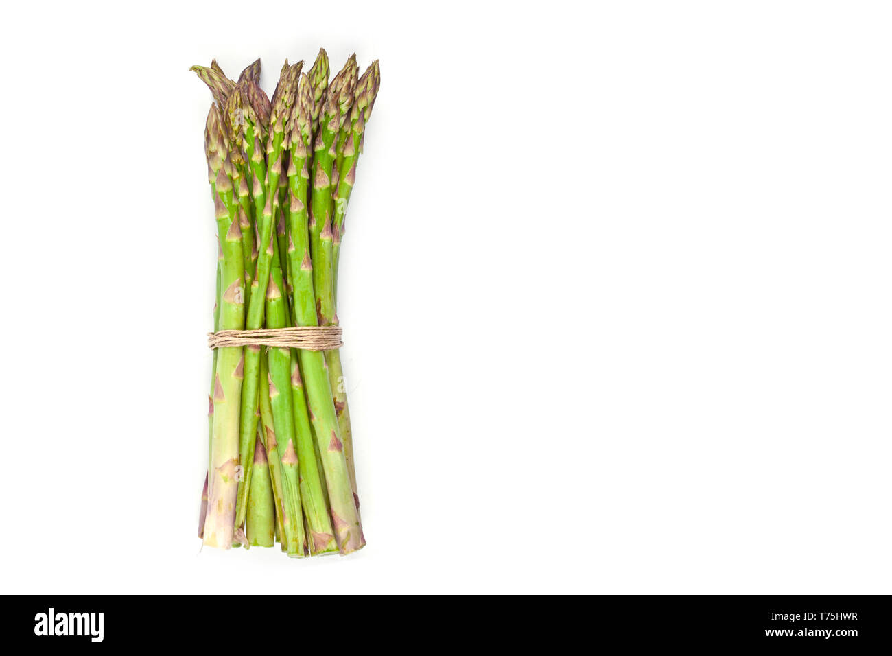 Bunch of fresh raw garden asparagus isolated on white background. Green ...