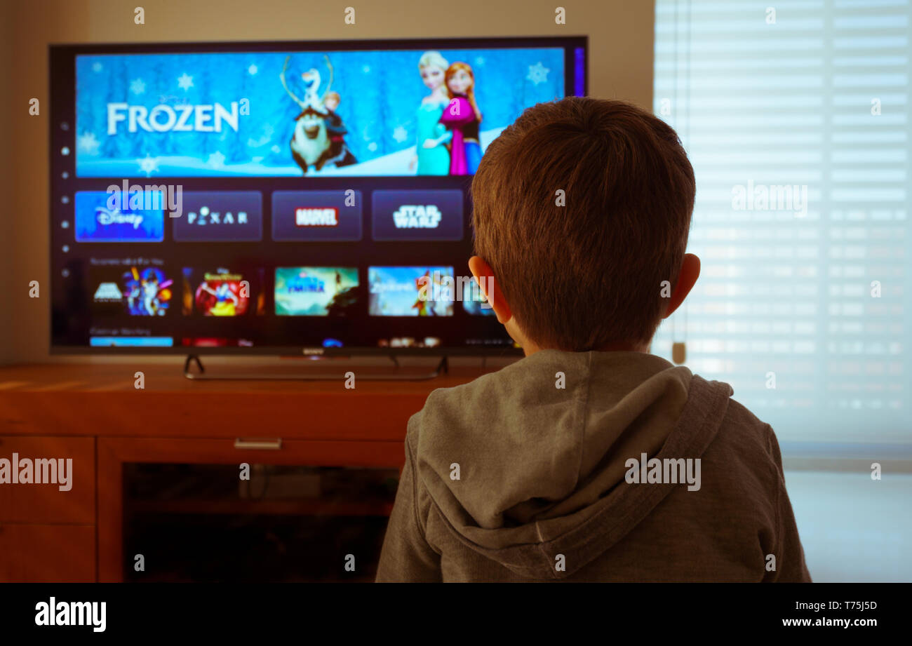 Barcelona, Spain. May 2019: Back view image of cute little boy watching ...