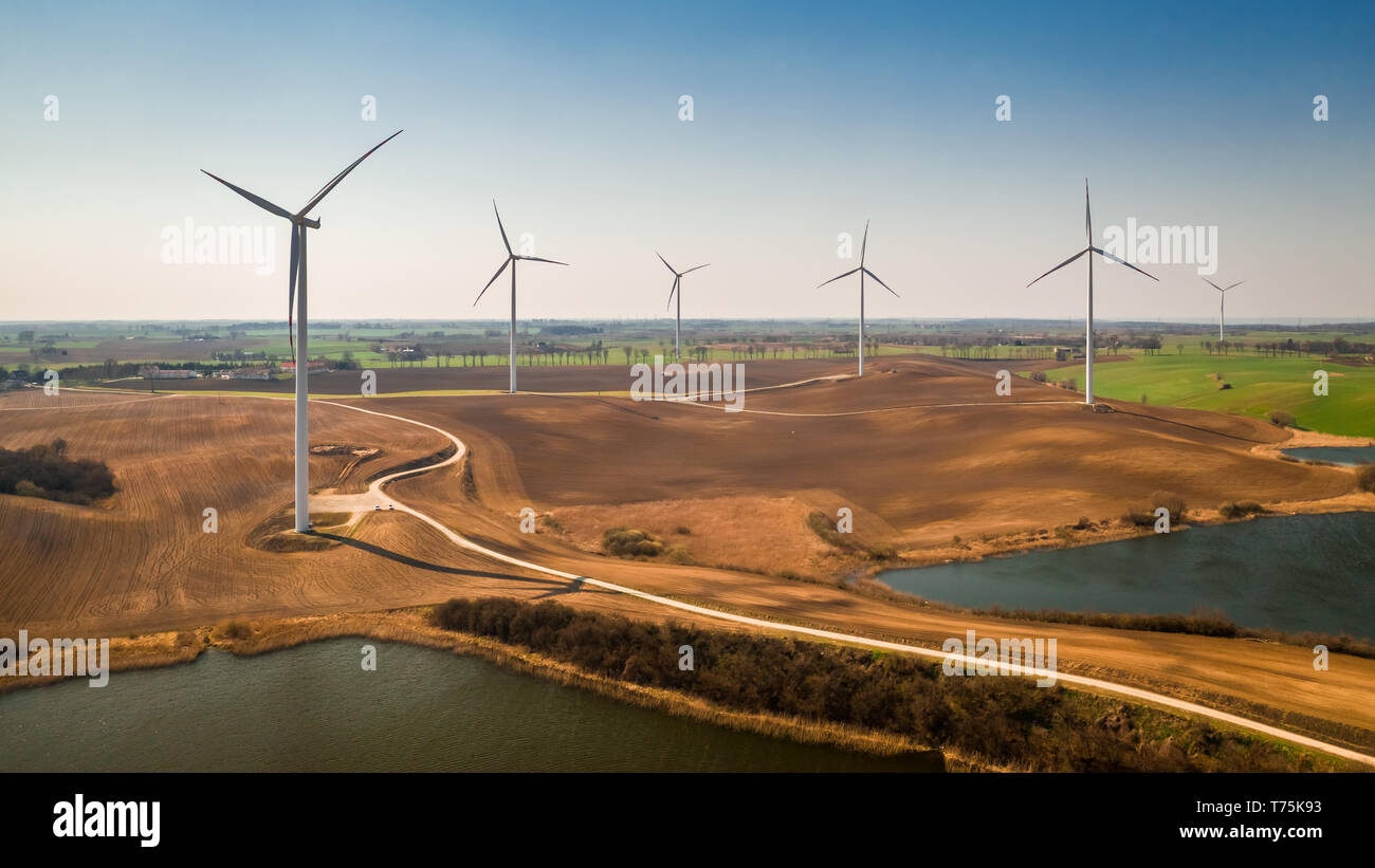 Wind turbines near lake in hi-res stock photography and images - Alamy