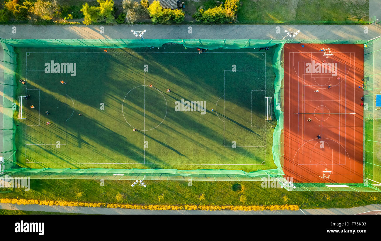 Aerial view of a sports field with footballers playing Stock Photo - Alamy