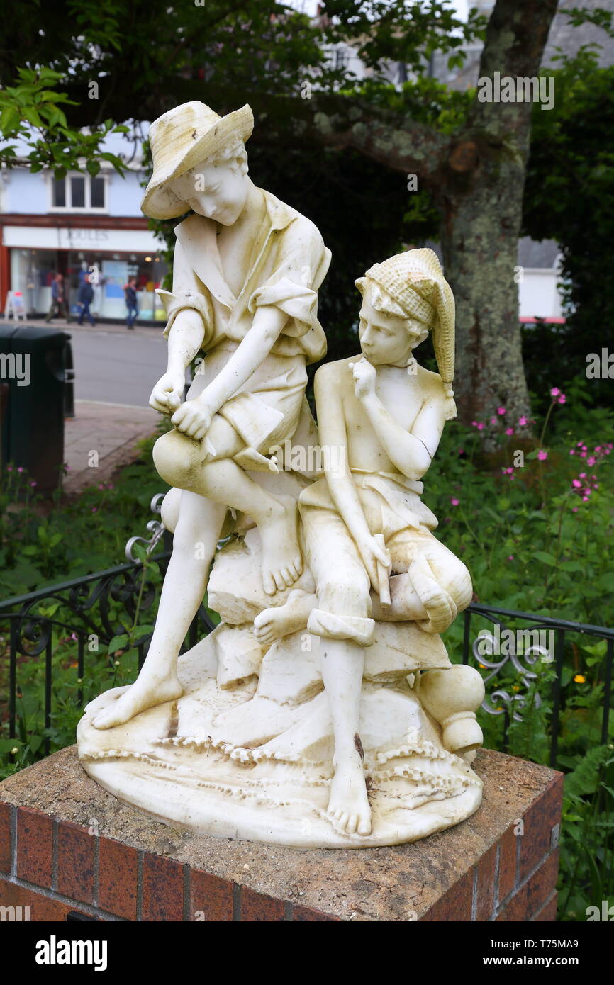 A statue of two boys in the park at Dartmouth, Devon, UK Stock Photo ...