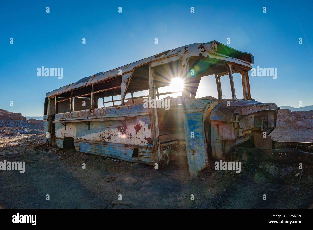 Backlit at the abandoned bus in the desert of Atacama, Chile Stock ...