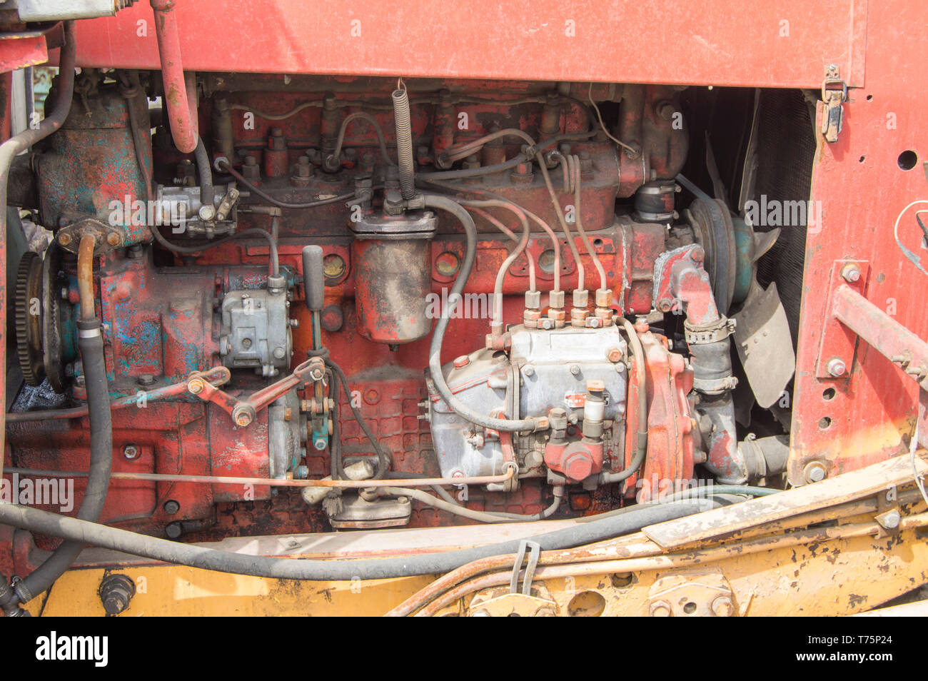 Close-up of old dirty tractor diesel engine parts Stock Photo - Alamy